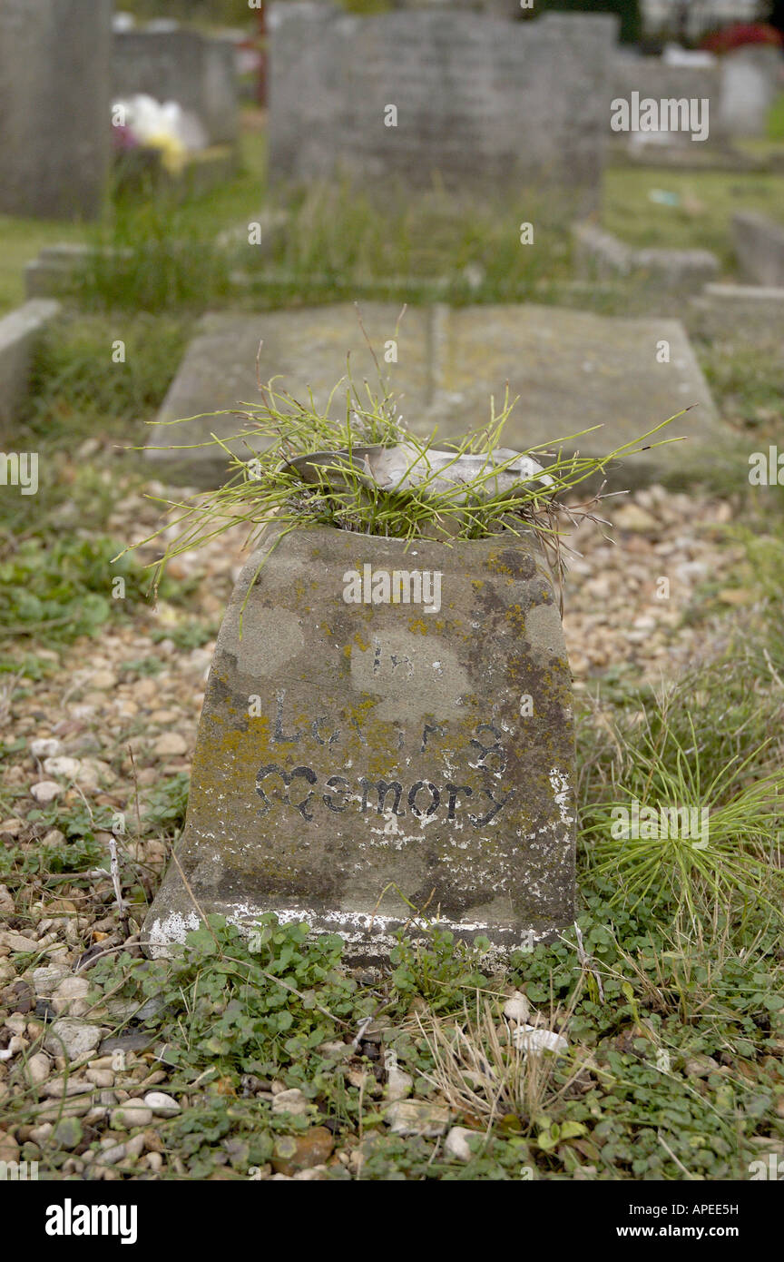 Damaged and neglected grave Stock Photo - Alamy