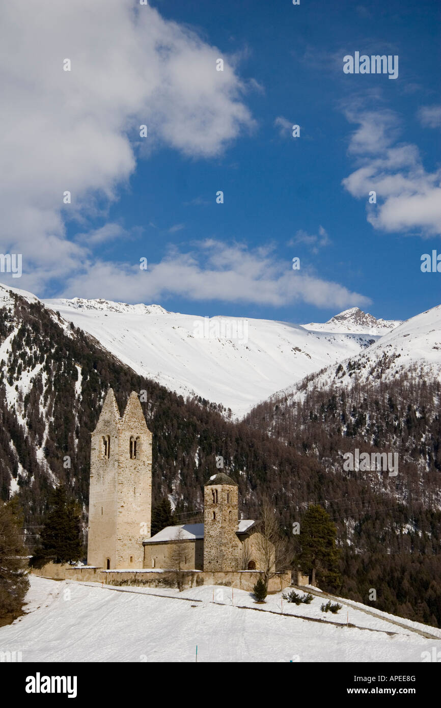 An old church and tower nestled in a valley of the swiss alps Stock ...