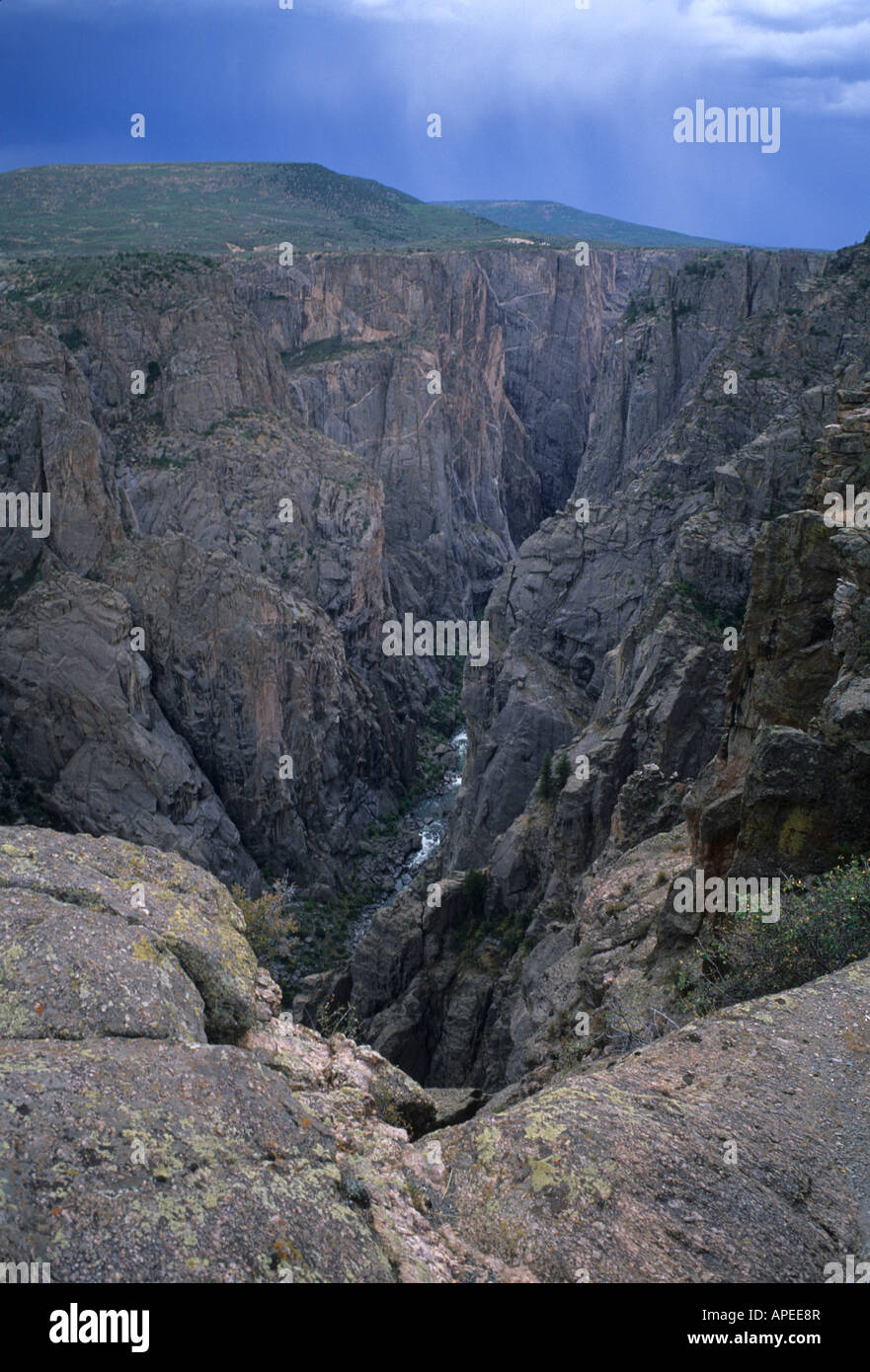 A view into the deep chasm of the Canyon at the river far below Stock ...