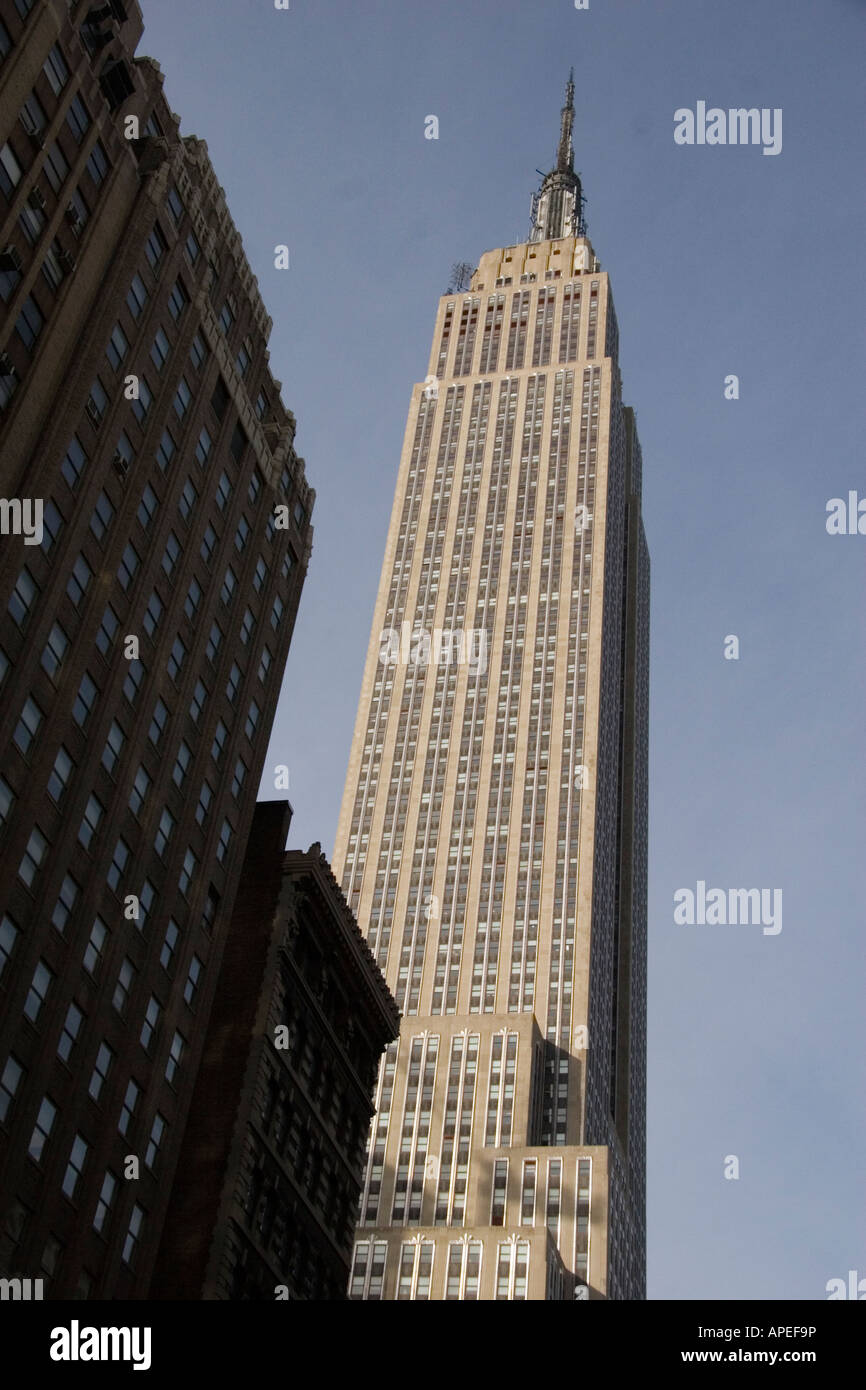 The Empire State Building towers over midtown Manhattan Stock Photo - Alamy