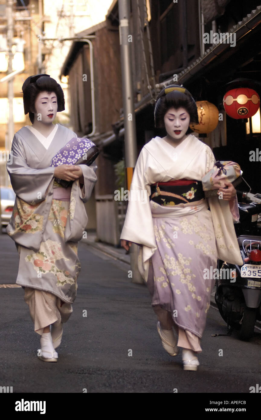 Two geisha walking in the streets of Gion in Kyoto Japan 2004 Stock ...