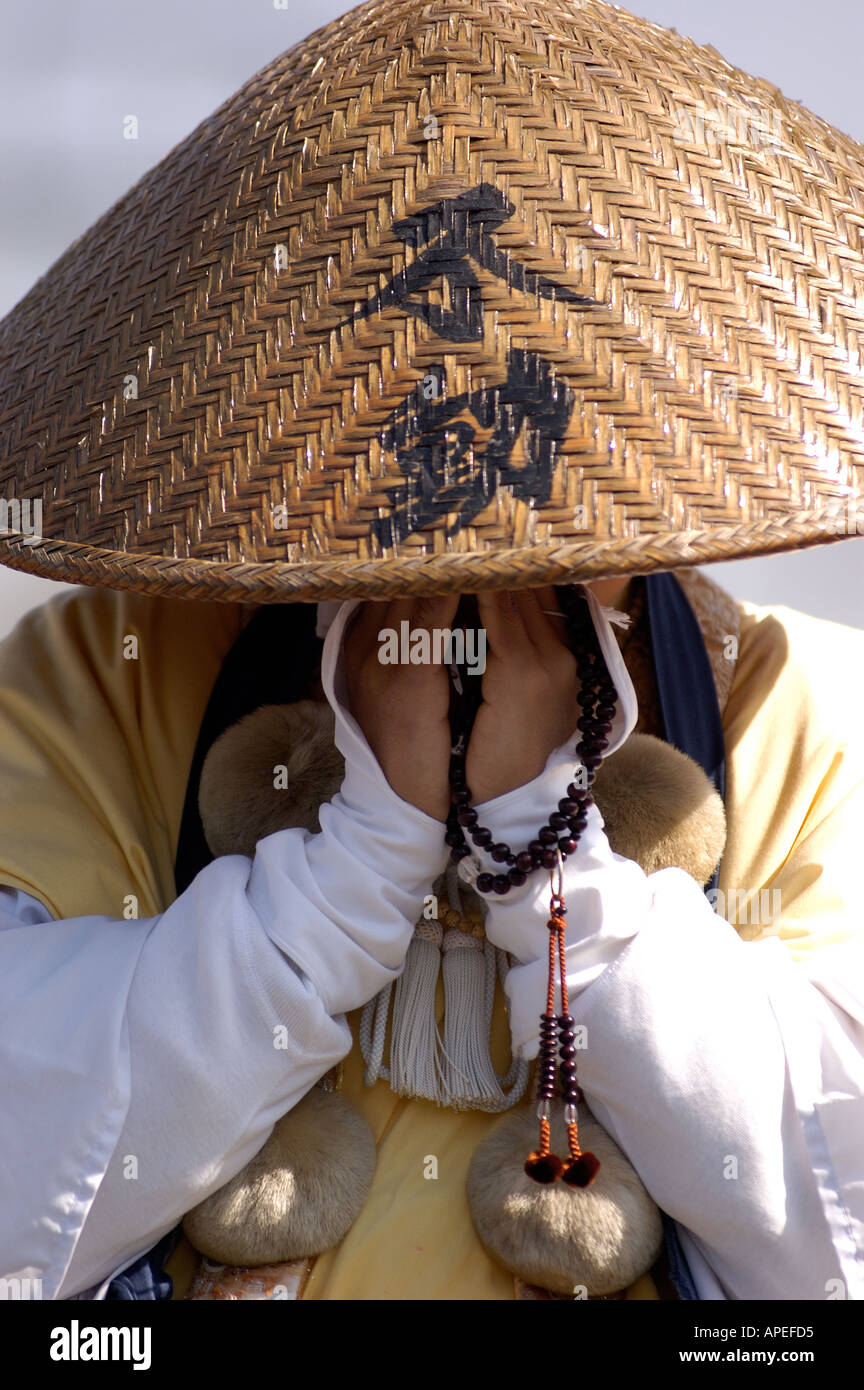 A monk begging for alms on street in Kyoto Japan Stock Photo - Alamy