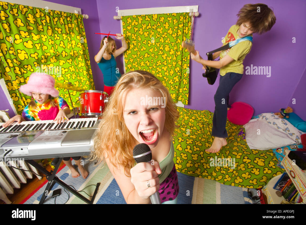 Kids playing instruments in band Stock Photo - Alamy