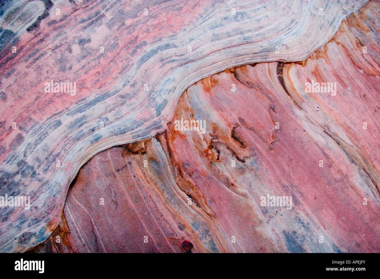 A close view of different rock layers on a cliff wall Stock Photo - Alamy
