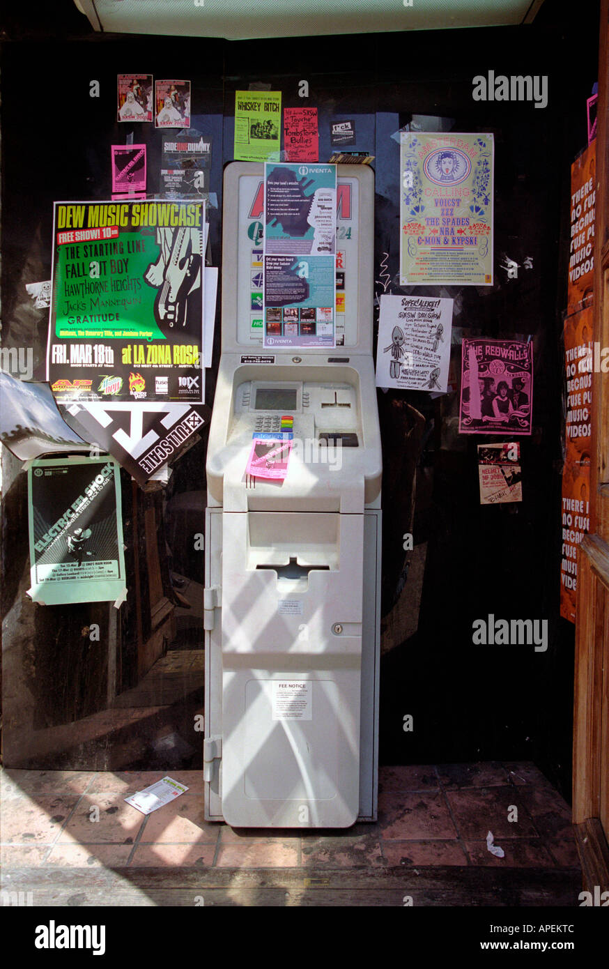 6th street austin texas atm machine covered in flyers and stickers ...