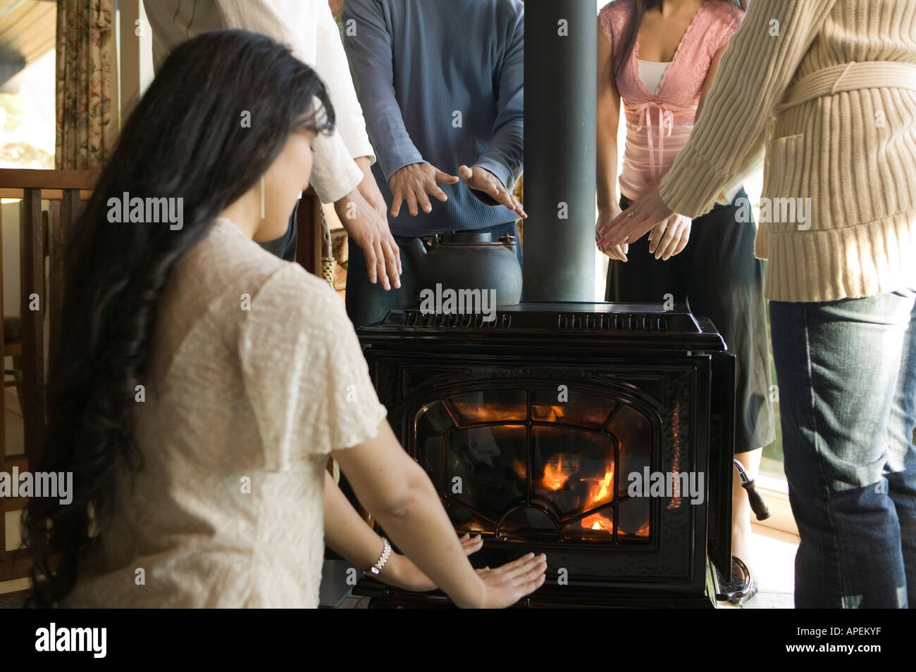 Man getting warm by the fire hi-res stock photography and images - Alamy