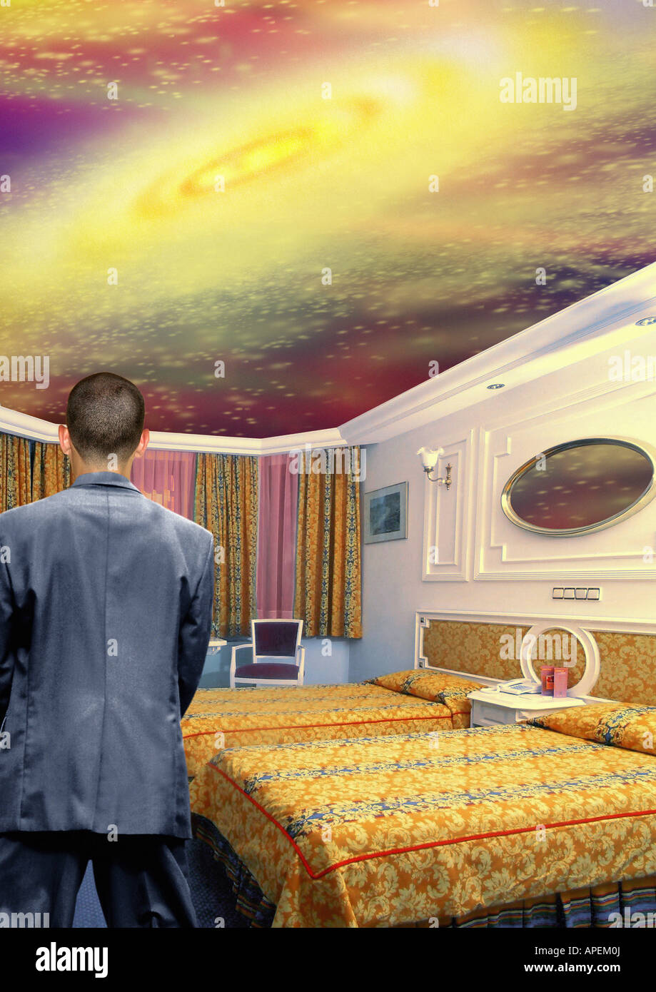 Man in surreal room with open ceiling Stock Photo - Alamy