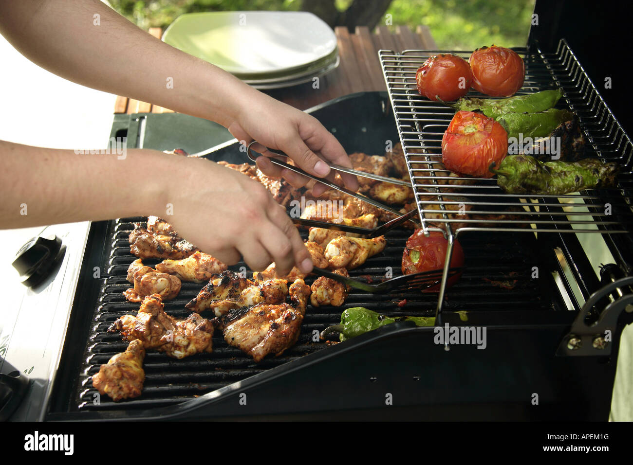 Cooking on outdoor grill, barbecue Stock Photo - Alamy