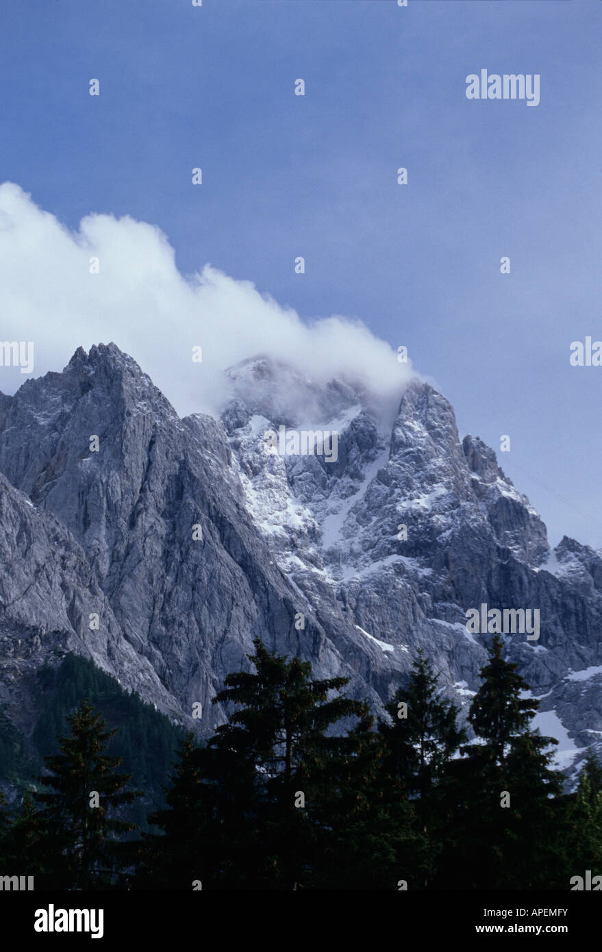 The highest mountain in Germany, Der Zugspitze, peak shrouded in fog ...