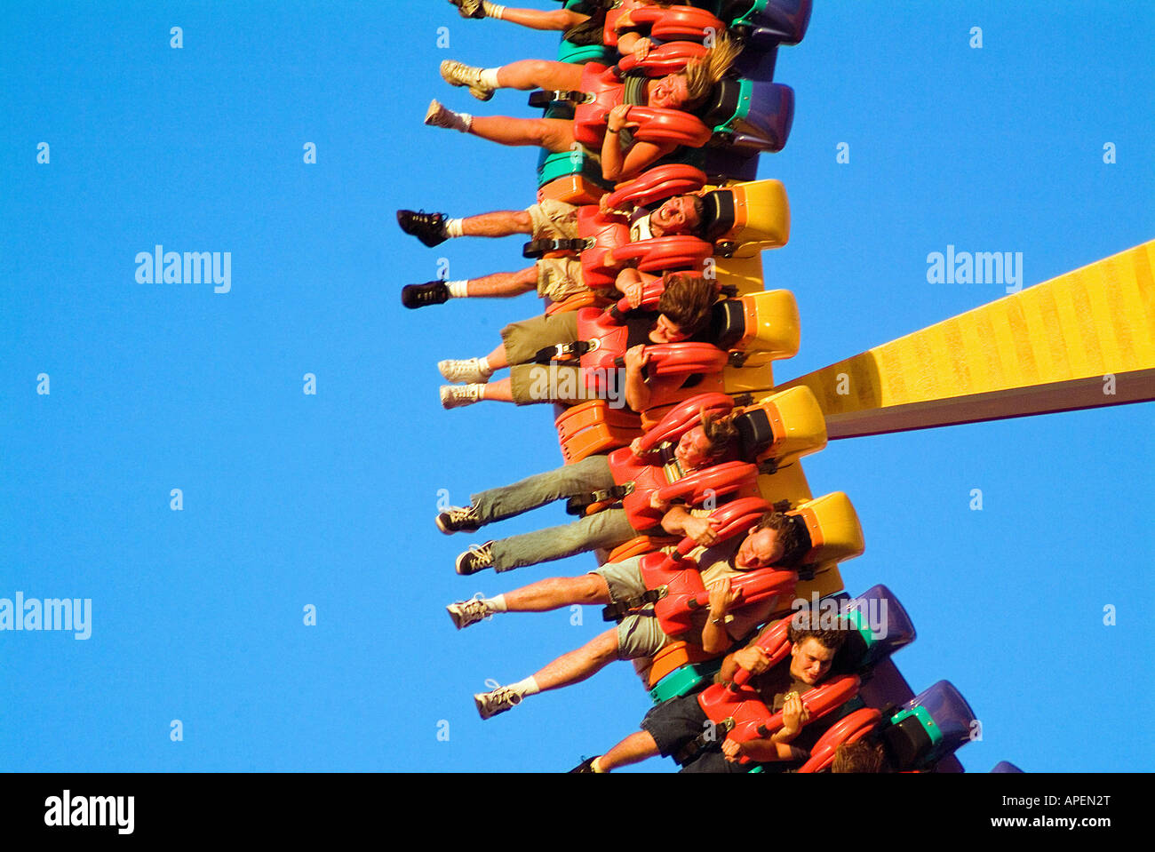 People ride amusement park ride Stock Photo - Alamy