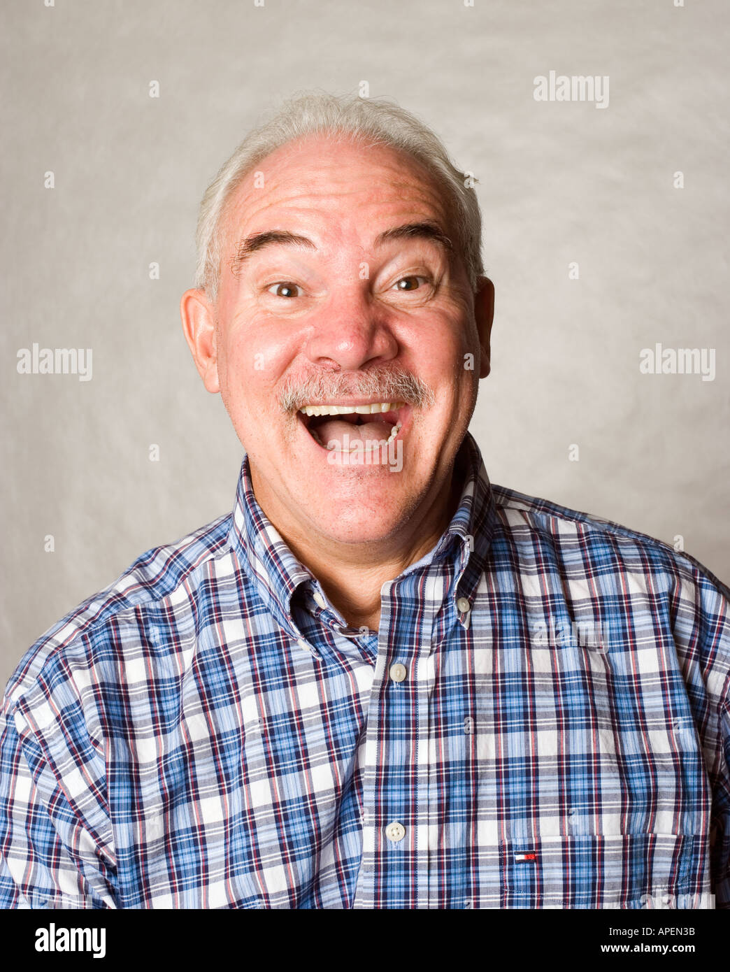 Latino male smiling older hi-res stock photography and images - Alamy