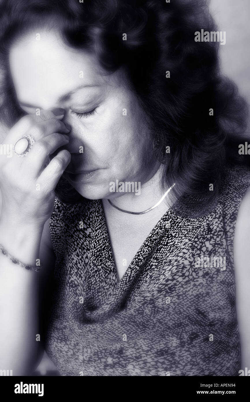 Older hispanic woman sad hi-res stock photography and images - Alamy