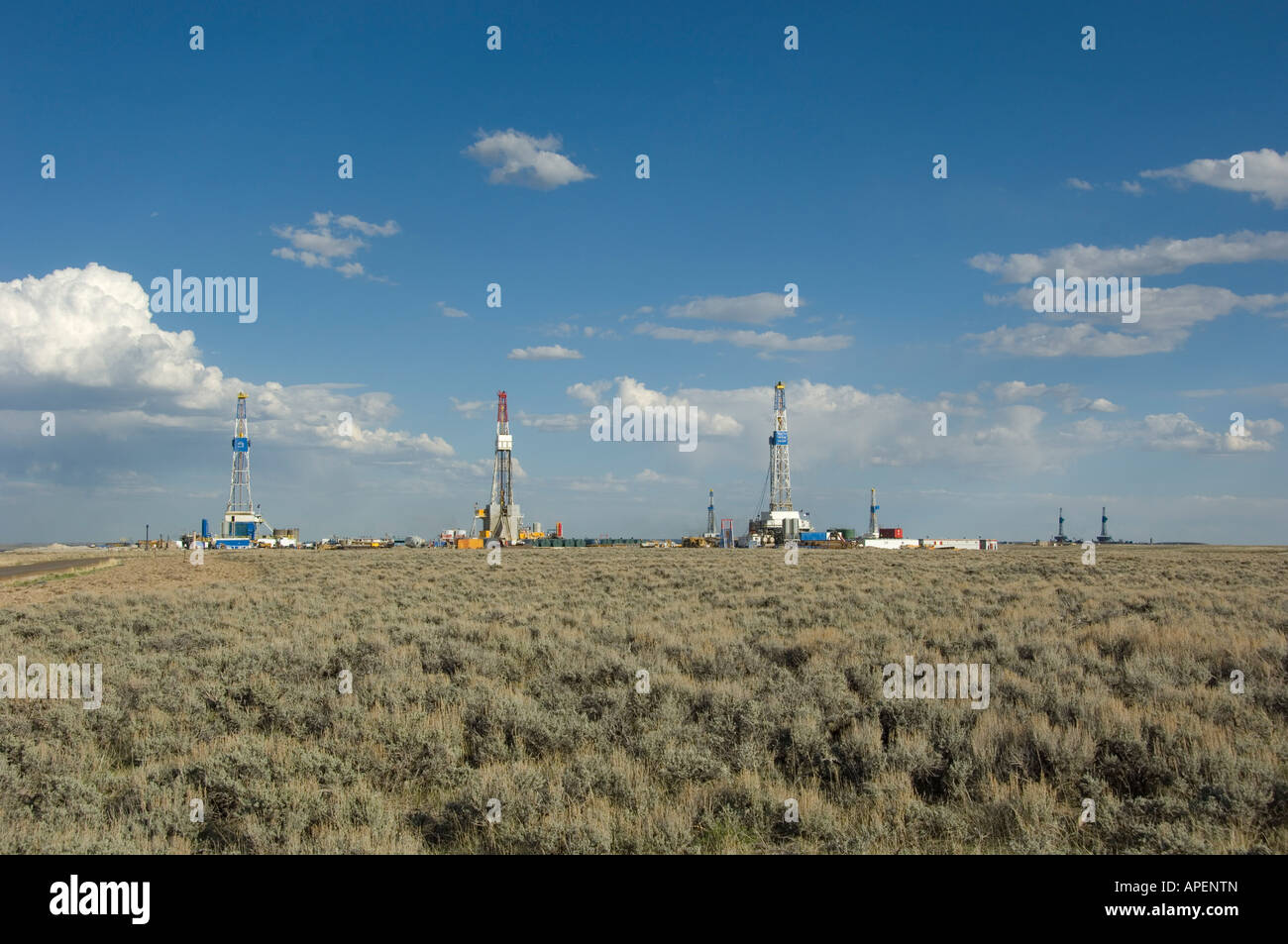 Many drilling rigs in the same area of Wyoming Stock Photo - Alamy