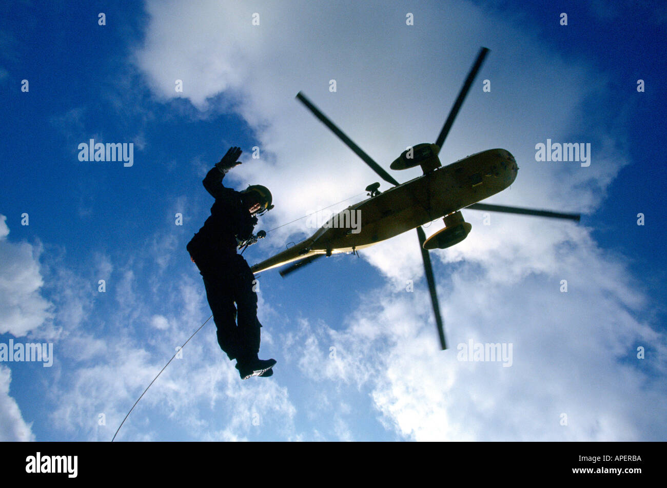 Helicopter rescue winch, RAF man, Cornwall, UK Stock Photo - Alamy