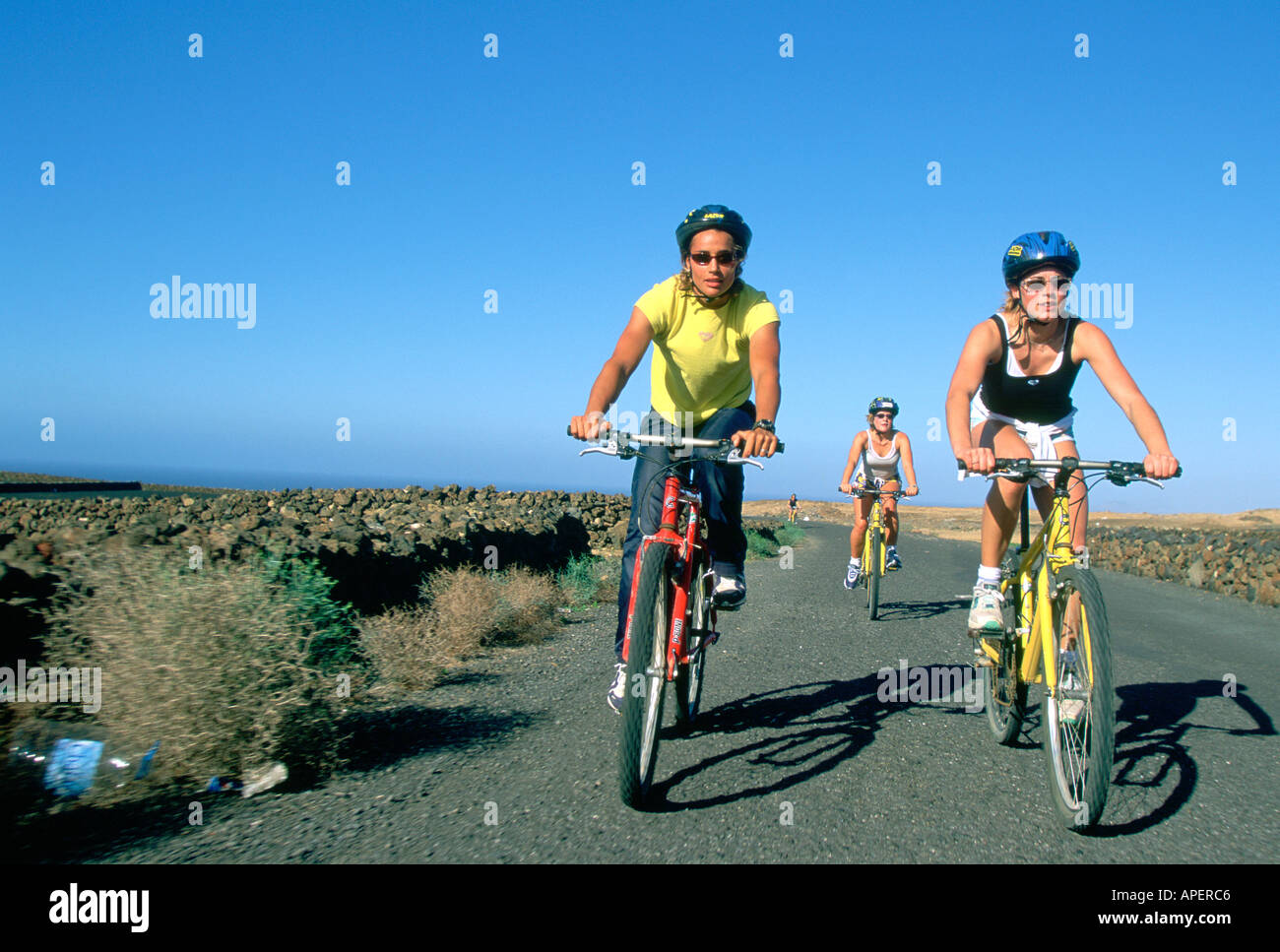 CYCLING AND JOGGING ACTION Stock Photo - Alamy