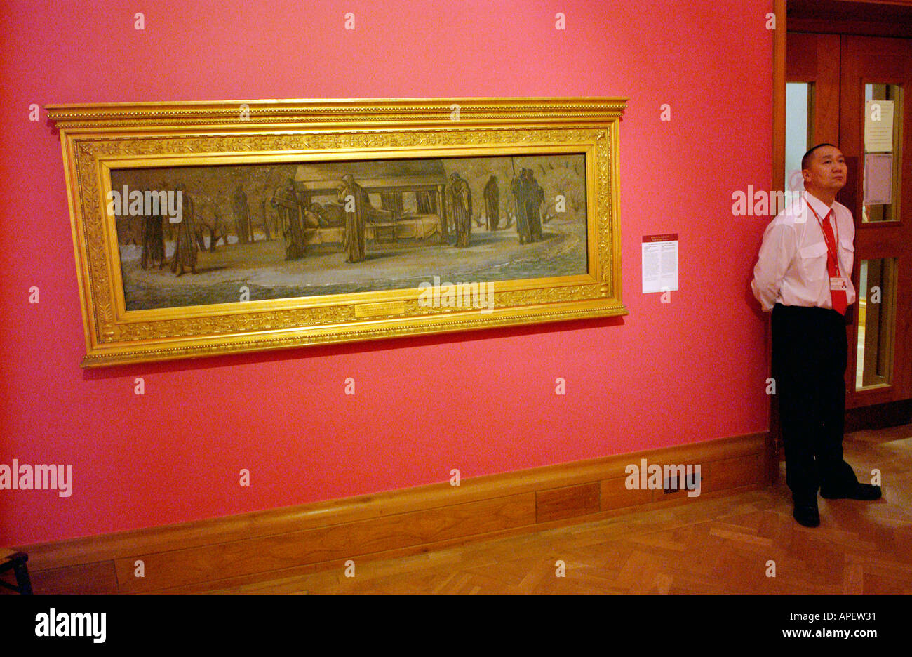 Security guard on duty in exhibition gallery at the National Museum ...