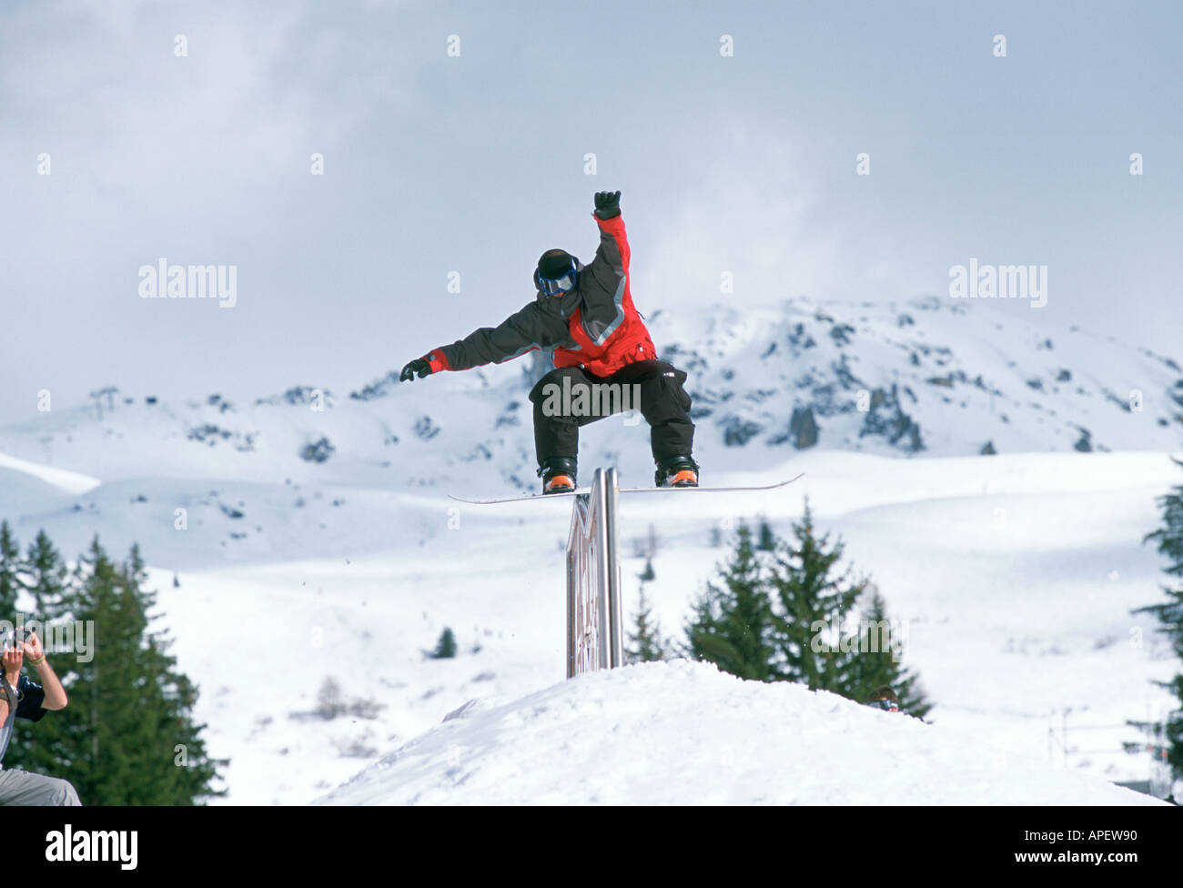 SLIDING A RAIL SNOWBOARD ACTION Stock Photo - Alamy