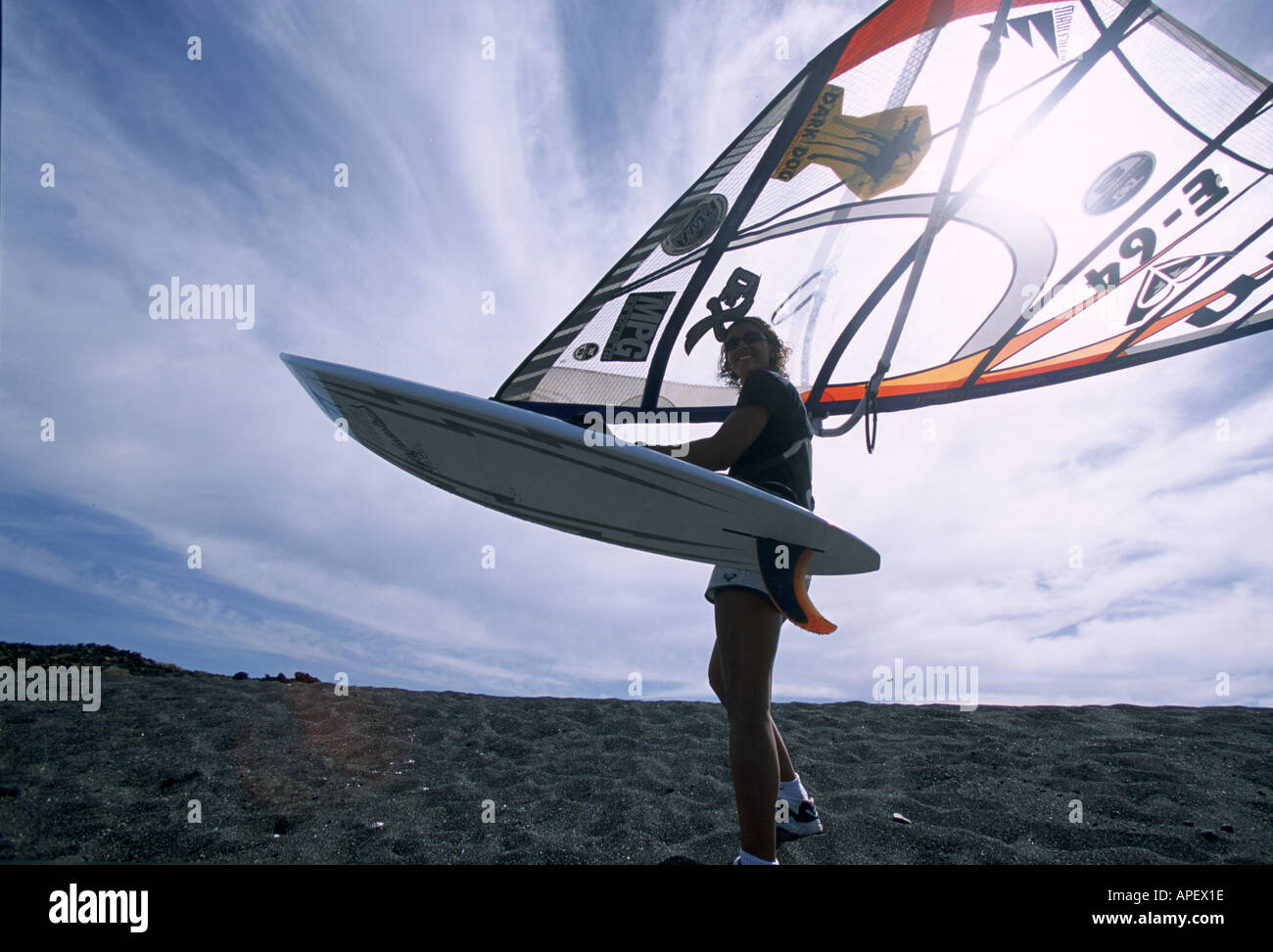 WOMAN AND WINDSURF Stock Photo - Alamy