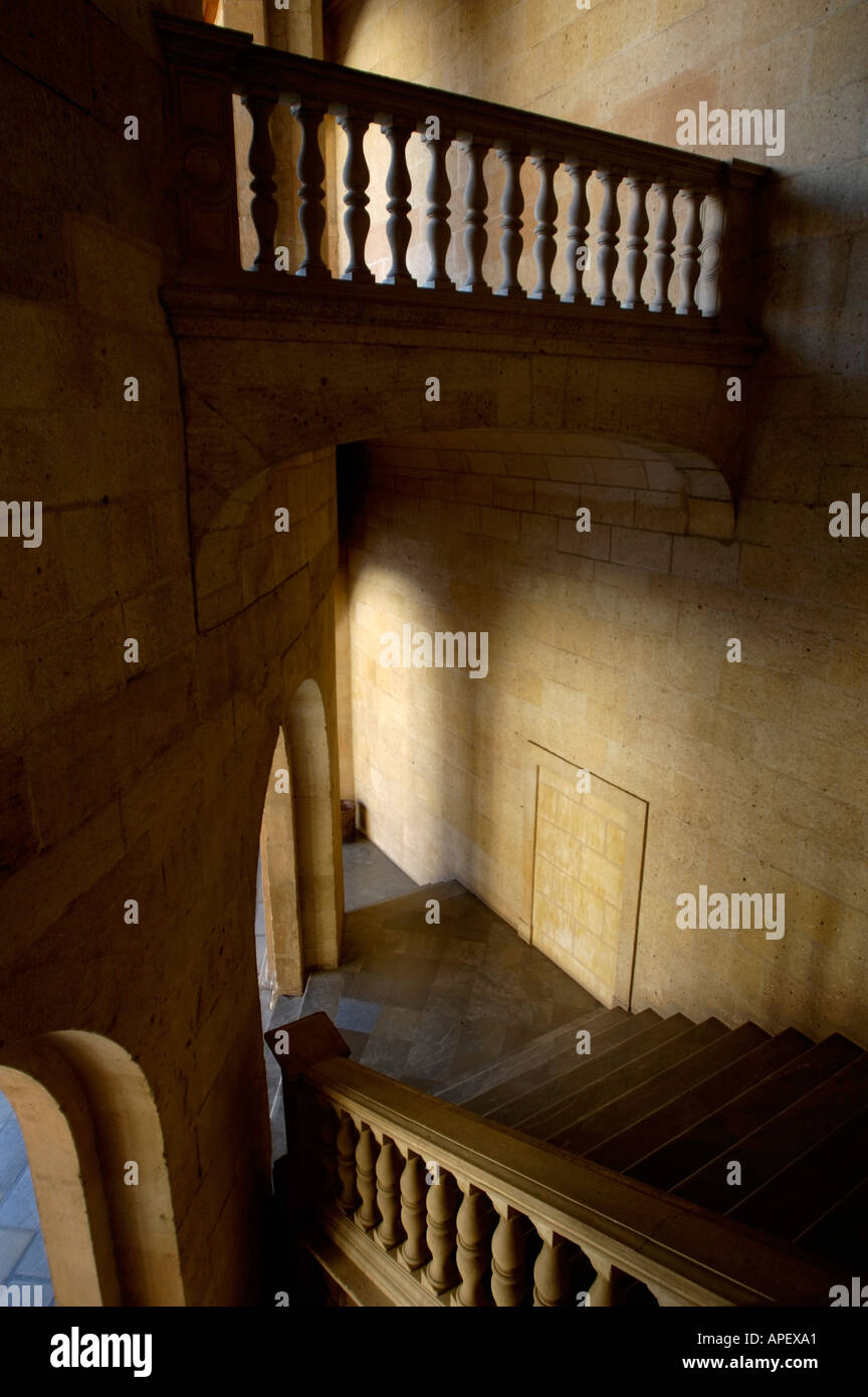 Stone stairwell inside the historic Palace of Charles V at Alhambra, a ...
