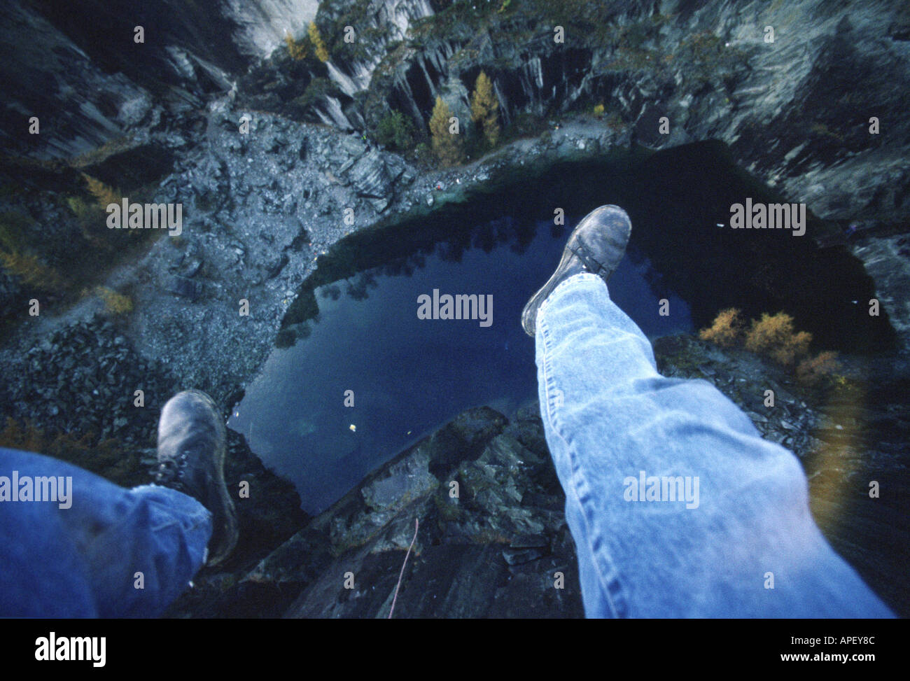 Hanging by feet hi-res stock photography and images - Alamy