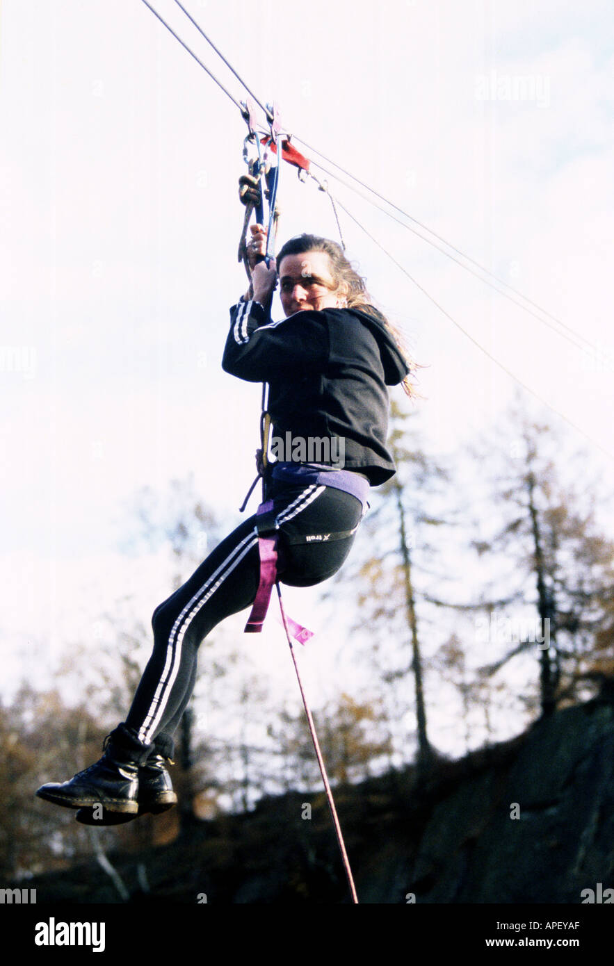FEMALE ZIPWIRE ACTION Stock Photo - Alamy