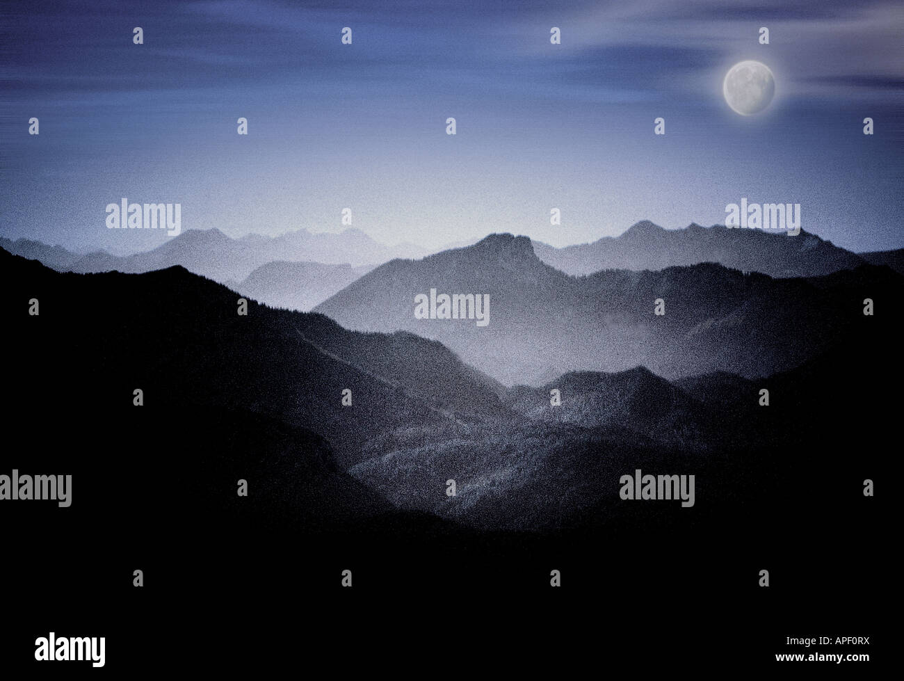 Mountain range with full moon at nightfall, blue tone. Austrian Tyrol ...
