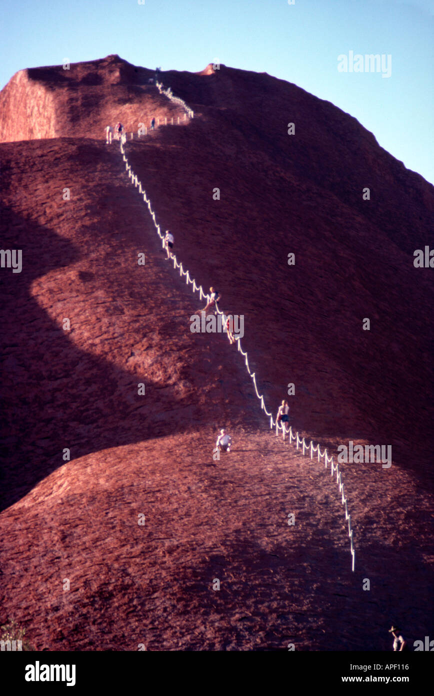 climbing Ayers rock Australia Stock Photo - Alamy
