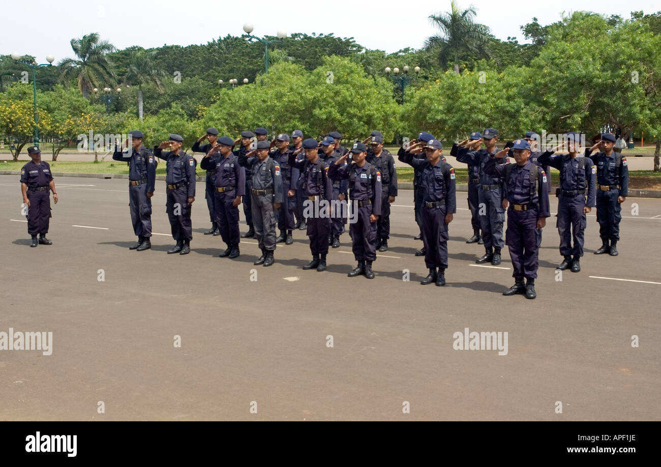 Indonesian police officers in central Jakarta practising marching and ...