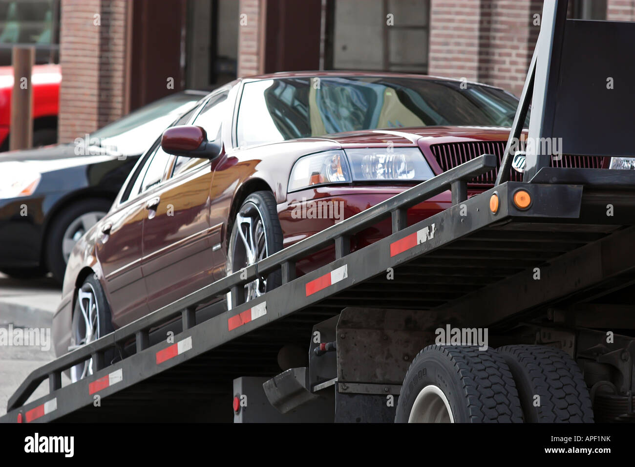 A car being towed Stock Photo - Alamy