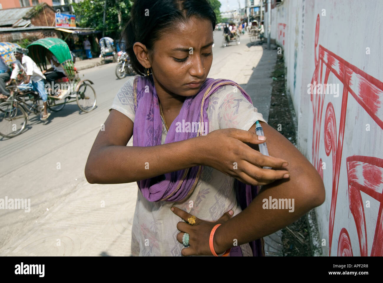 Drug users on the streets of Dhaka Bangladesh Stock Photo - Alamy