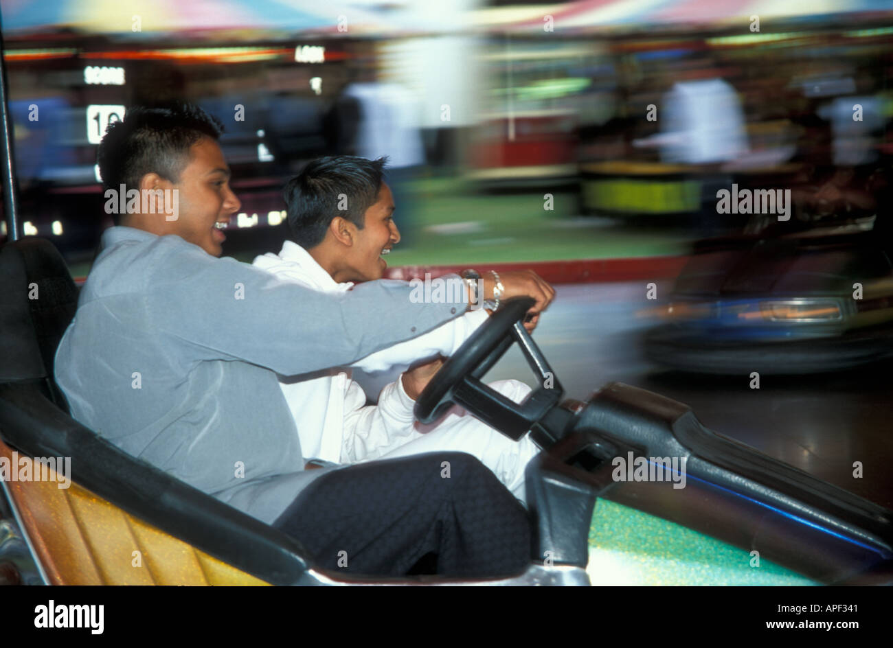 People having fun in an amusement park Stock Photo - Alamy