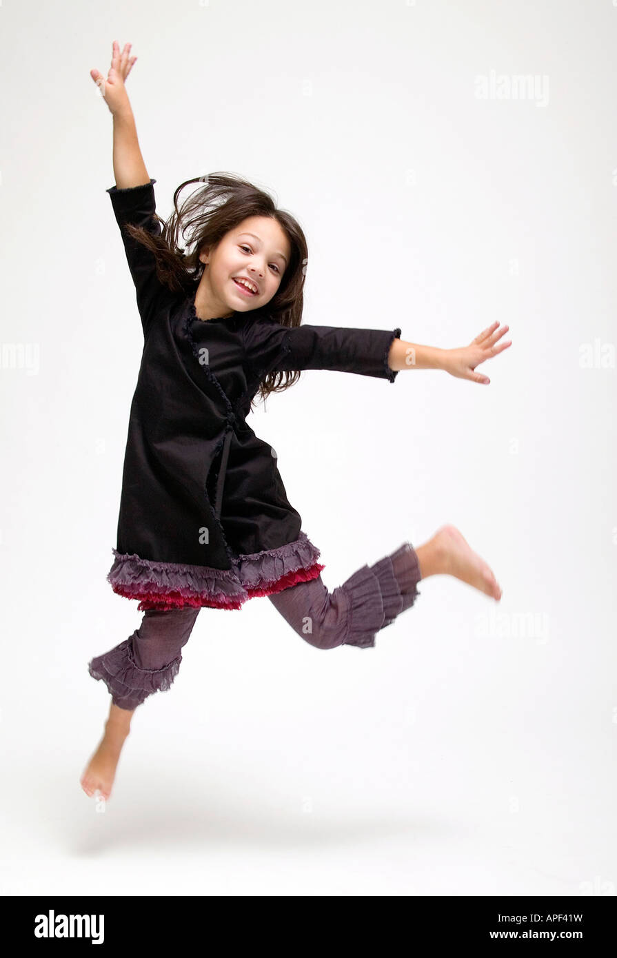 Girl jumping for joy Stock Photo - Alamy