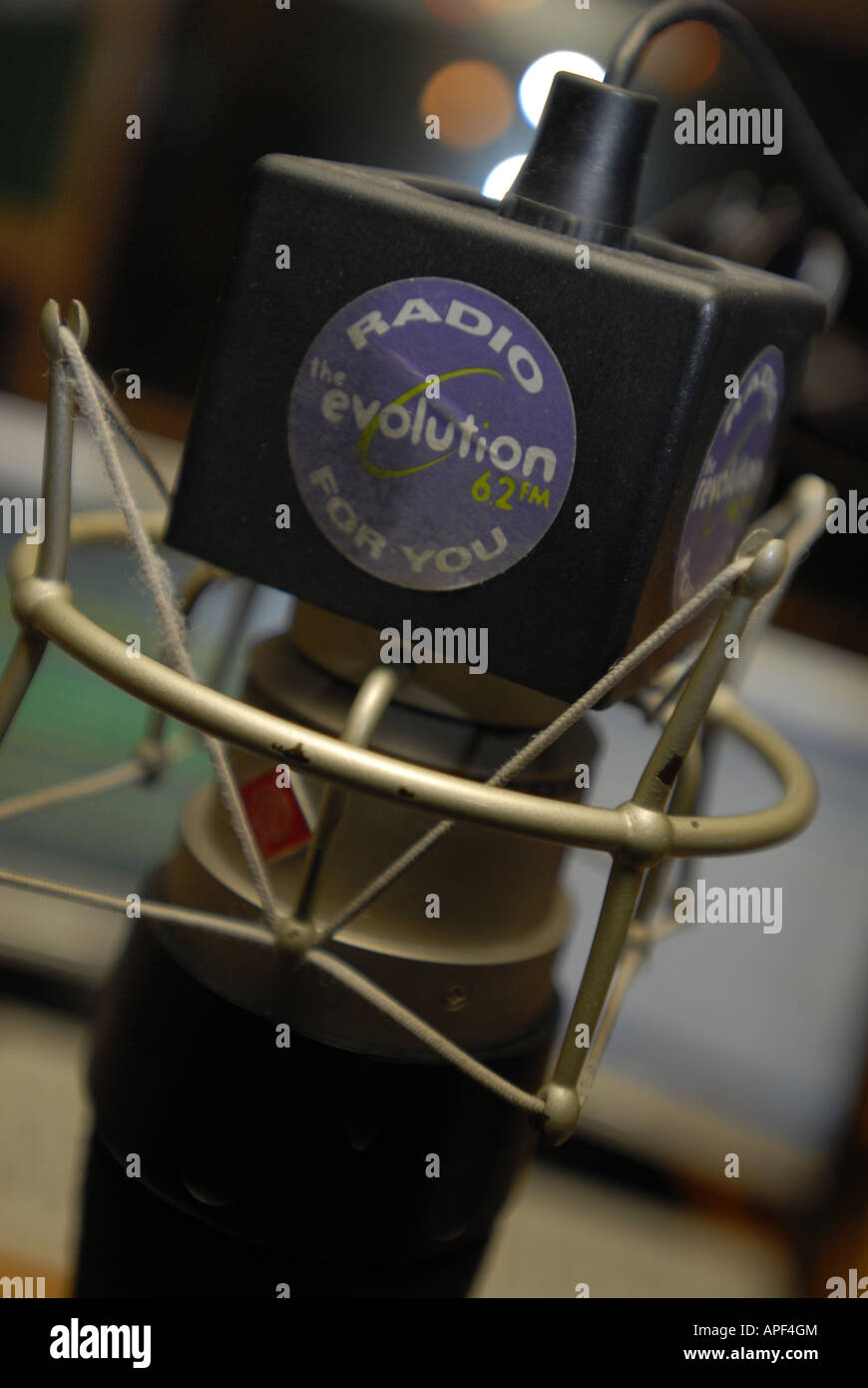 a dj microphone at a radio station mixing desk Stock Photo - Alamy