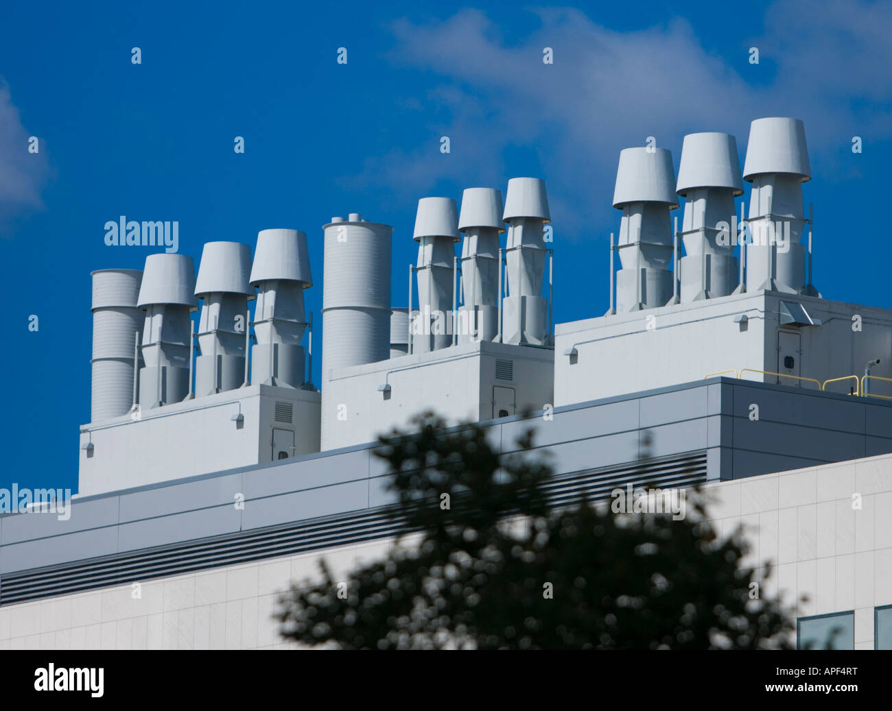 Exhaust vents on top of a building Stock Photo - Alamy