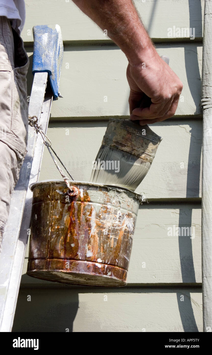 Wiping off excess paint hi-res stock photography and images - Alamy