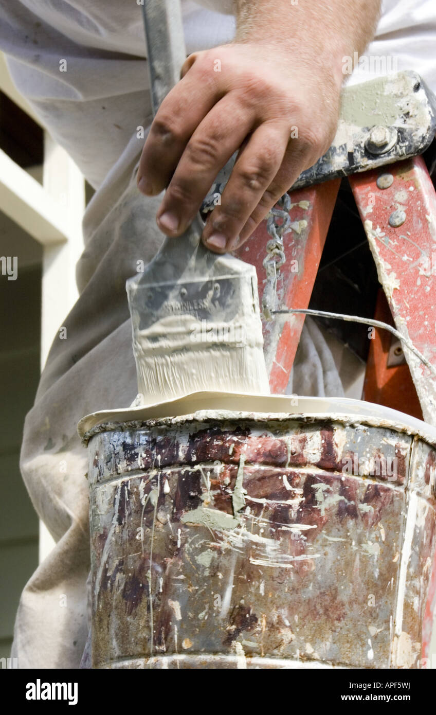 Wiping off excess paint hi-res stock photography and images - Alamy
