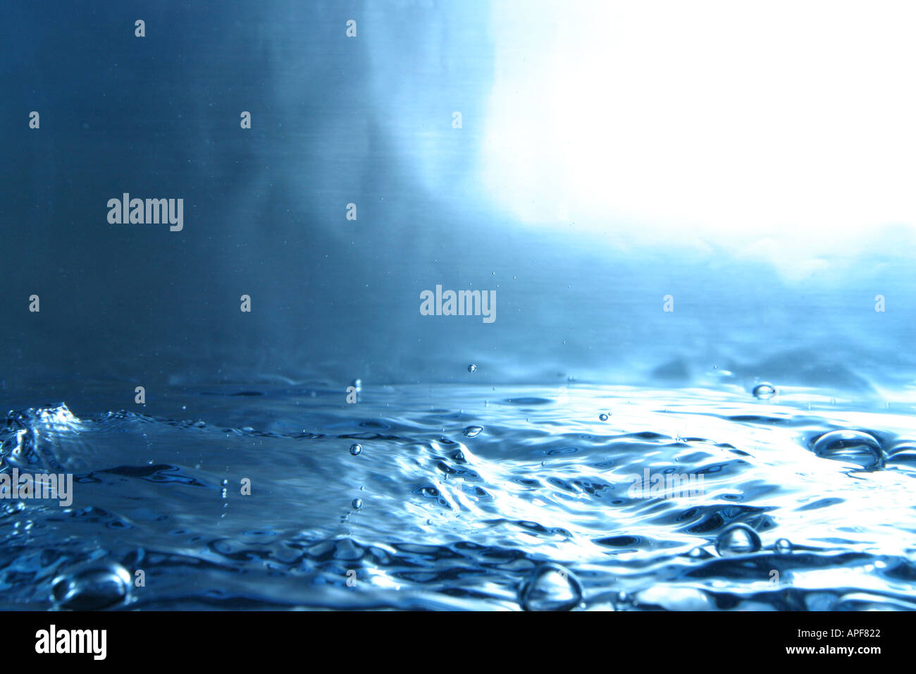 water surface with bubbles seen from under water turned by 180 degrees ...