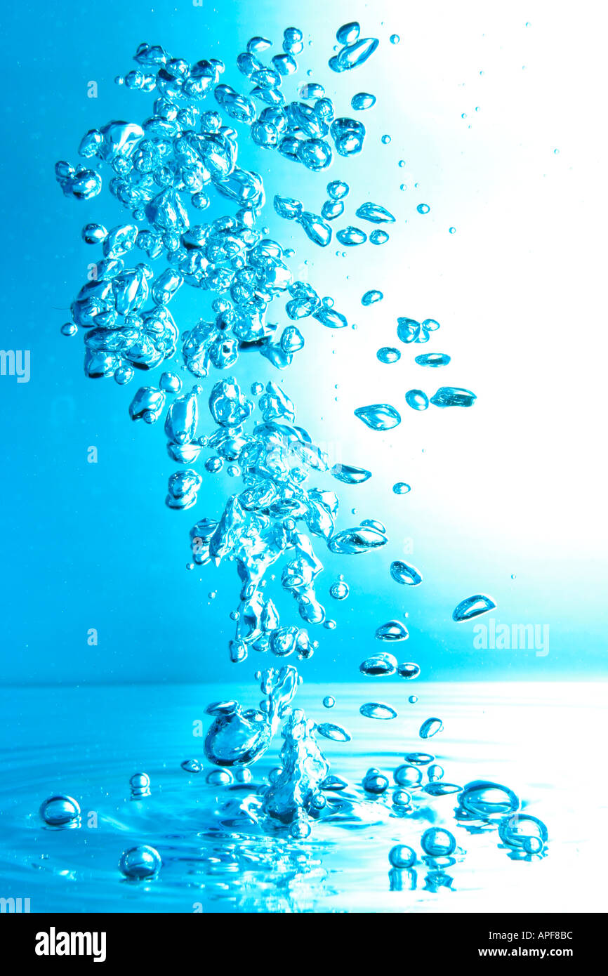 water jet gets through water surface picture is turned by 180 degrees o ...