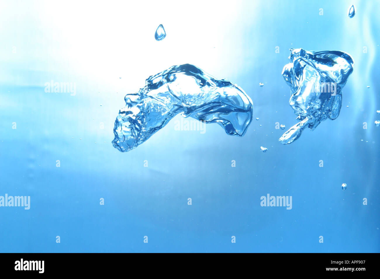 bubbles in the shape of faces in a fish tank Stock Photo - Alamy