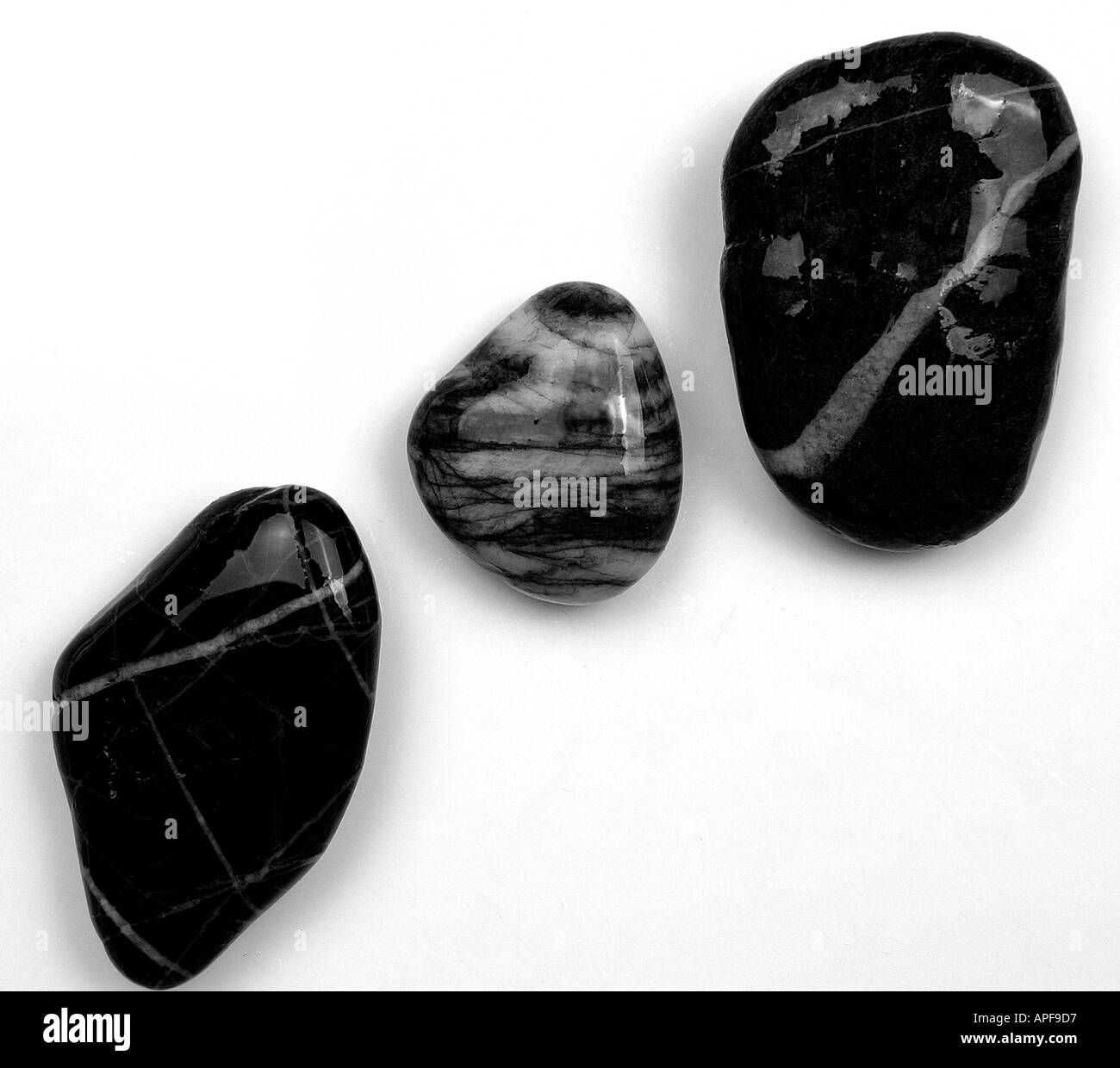 3 quartz veined stones in diagonal pattern France Stock Photo - Alamy