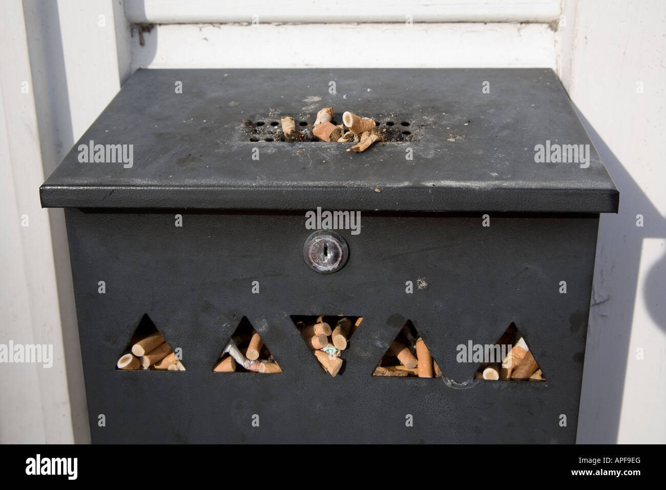 Cigarette waste butt collection box Stock Photo - Alamy