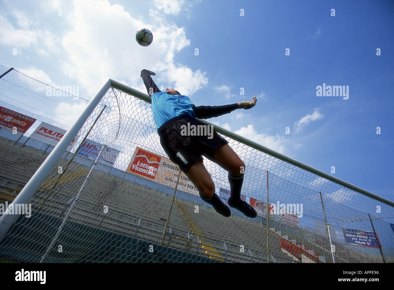 Goalkeeper punching ball hi-res stock photography and images - Alamy