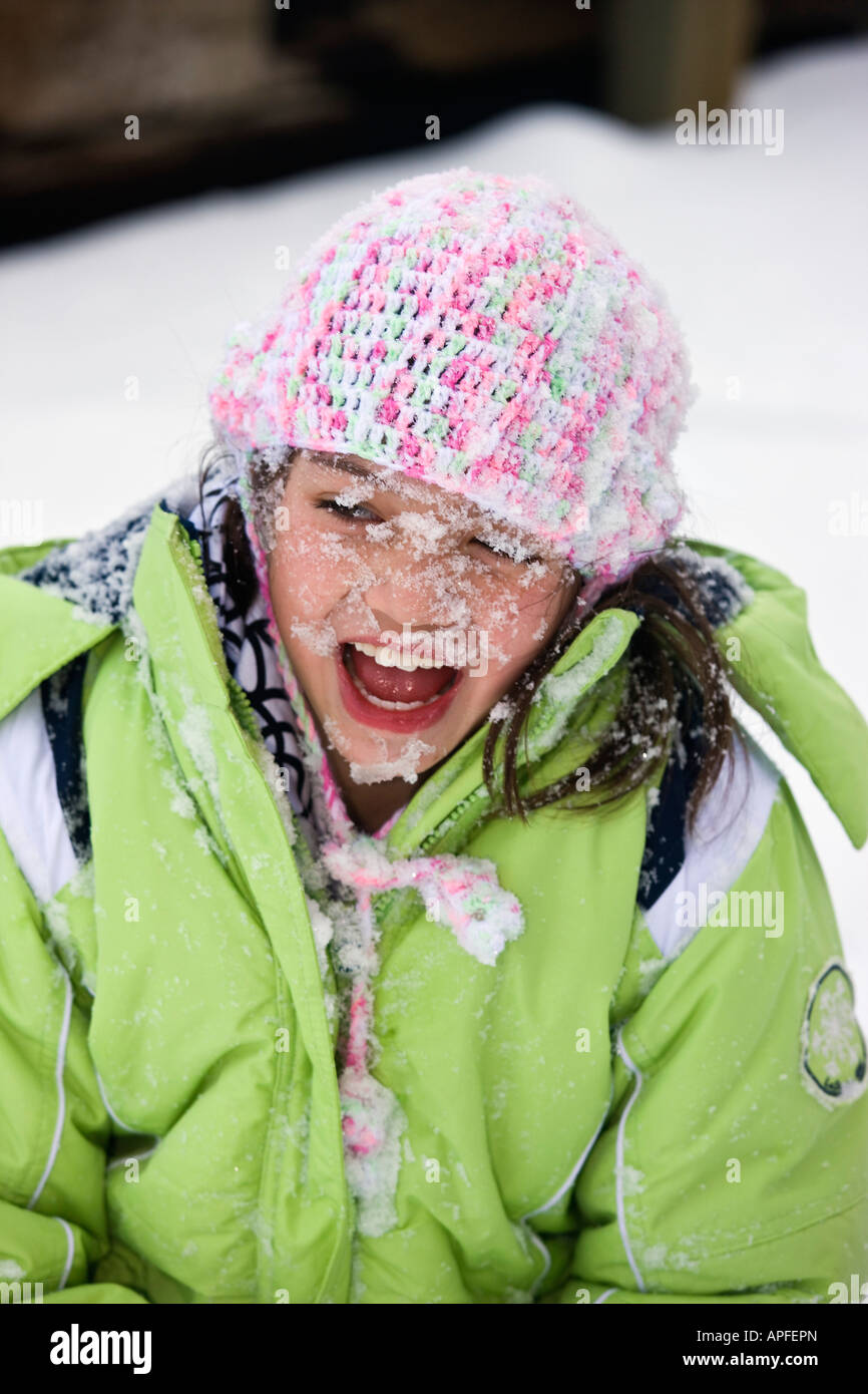 Girl with snow covered face Stock Photo - Alamy