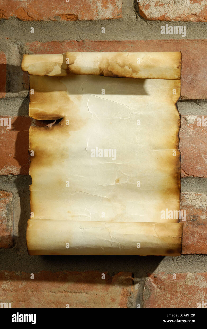 Old parchment on a red brick wall Stock Photo - Alamy