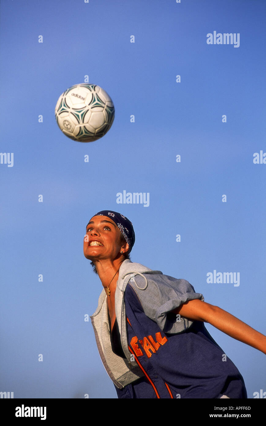 Boy bouncing football hi-res stock photography and images - Alamy