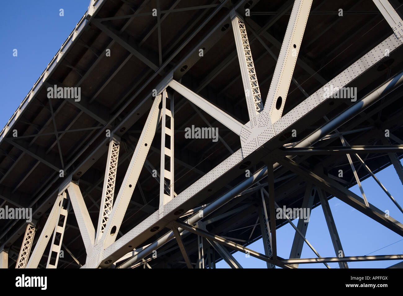 The steel underpinnings of a bridge Stock Photo - Alamy