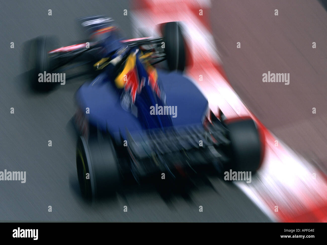 Formula one car at speed on chicane, Grand Prix Stock Photo - Alamy