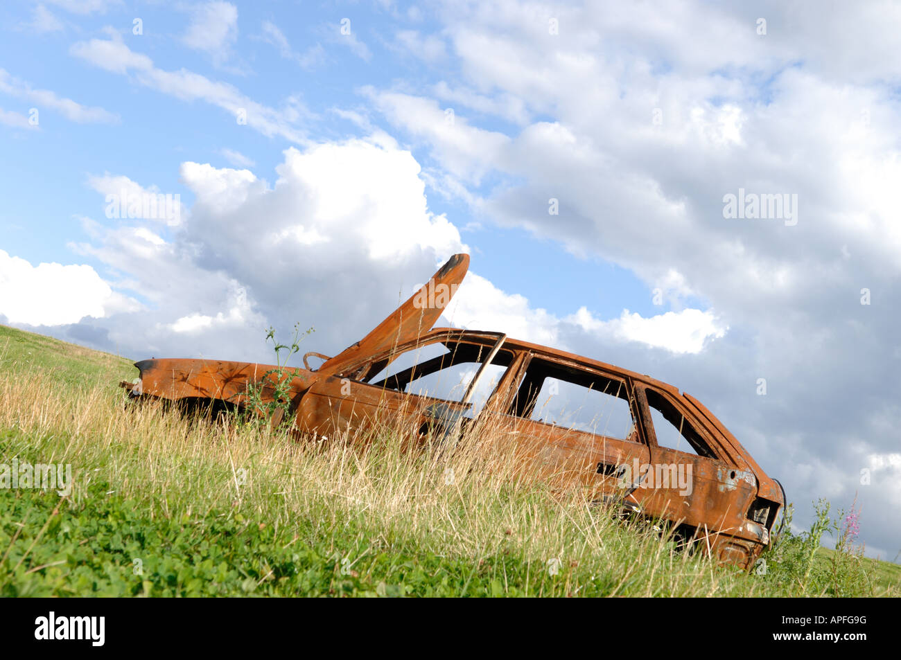 Fly tip car Stock Photo - Alamy