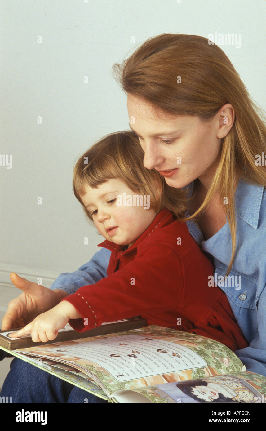 mother and child reading together Stock Photo - Alamy