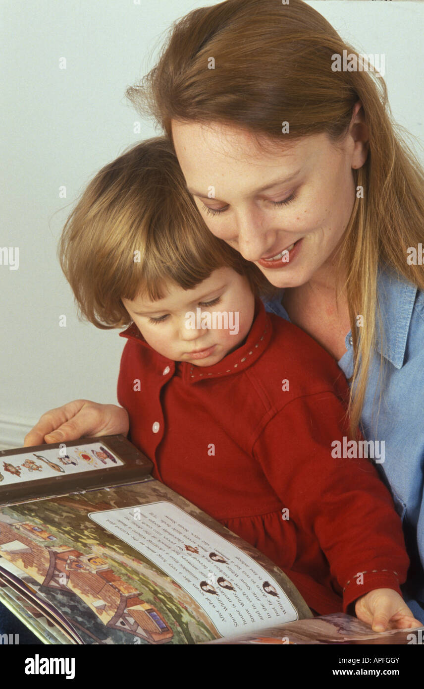 mother and child reading together Stock Photo - Alamy